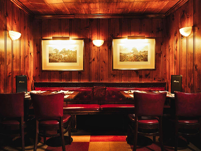 The warm glow of these wood-paneled walls has absorbed decades of laughter, business deals, and "I think I'll have the ribeye again" decisions.