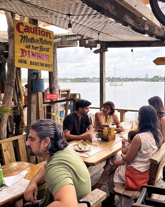 "Mother Nature at her Best" the sign proclaims, and the diners soaking in that waterfront view couldn't possibly disagree.