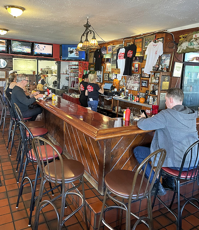 The bar&mdash;where strangers become friends, sports debates are settled, and the bartender remembers exactly how you like your burger.