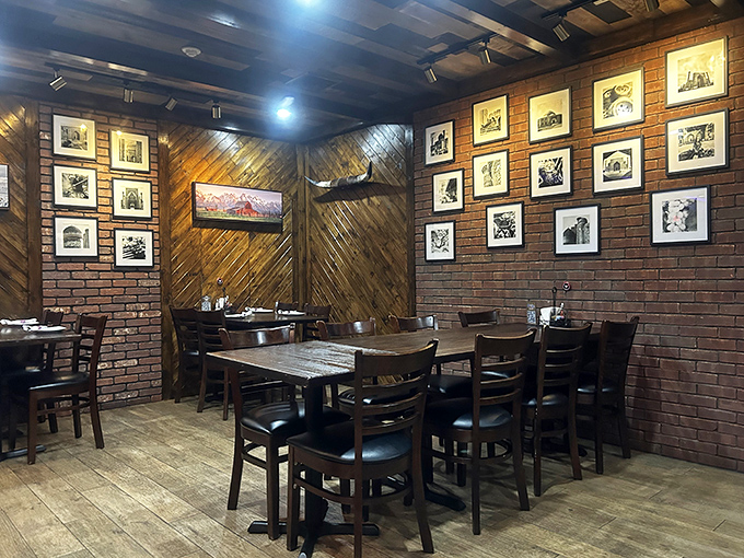 Brick walls lined with framed memories and wooden accents create an atmosphere that's both timeless and inviting. Comfort never goes out of style.