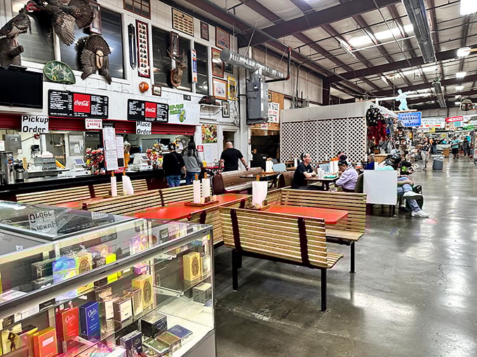The food court offers a moment of respite for weary shoppers. Those wooden benches have witnessed countless "look what I found" conversations. 