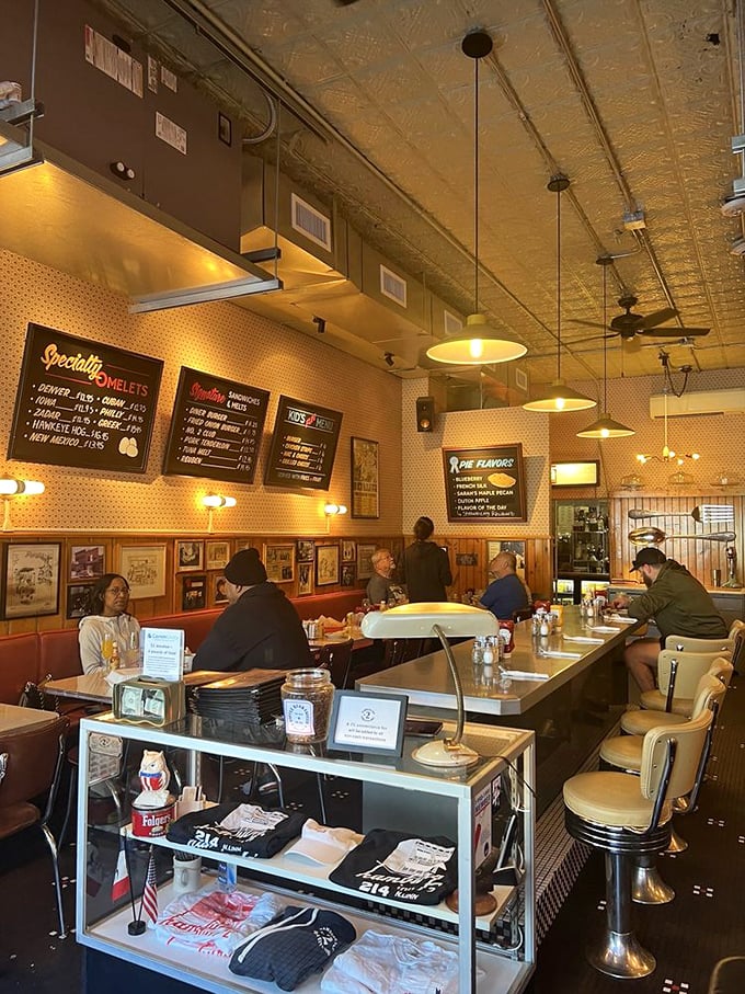 The menu boards have probably changed over decades, but that warm glow of pendant lights and conversation hasn't wavered a bit.