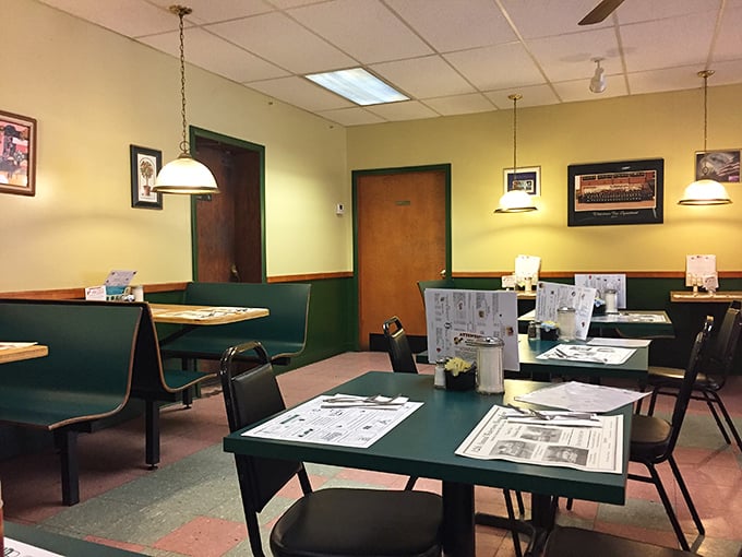 Green tables, simple chairs, and newspapers waiting to be read. This is where Watertown starts its day, one coffee cup at a time.