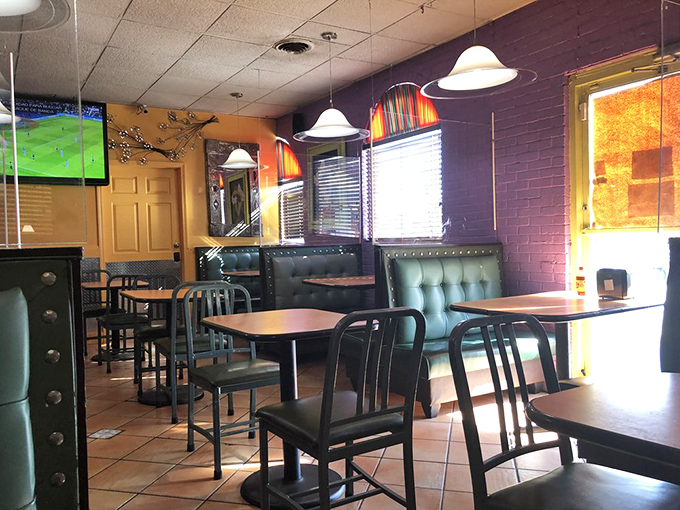 The dining area's purple and yellow walls aren't just cheerful&mdash;they're practically mariachi music in paint form, setting the stage for flavor festivities.