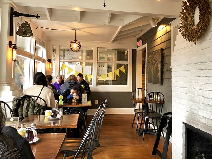 Where breakfast memories are made. Cozy corners and warm wood create the backdrop for morning conversations worth remembering.