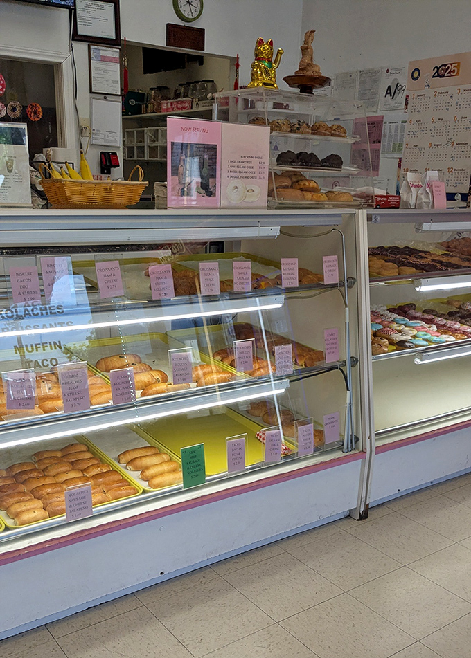 The display case &ndash; a museum of morning masterpieces where each pastry waits patiently for its forever home. Choose wisely, choose often.