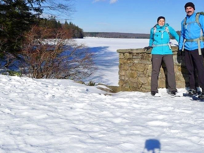 Winter transforms Promised Land into a snow-covered wonderland. The frozen lake creates a whole new playground for cold-weather adventurers.