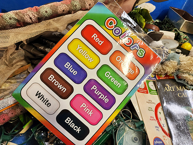 Educational charts find second lives among the treasures. Someone's kindergarten color lesson becomes your kitchen's quirky wall art.