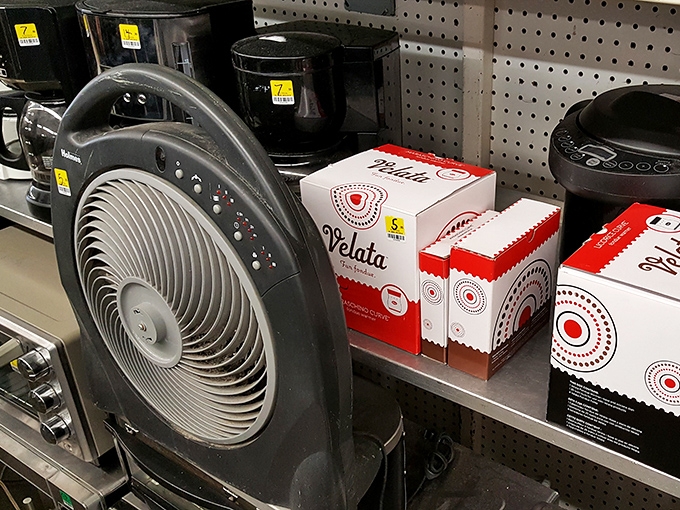 Small appliance section: where yesterday's must-have gadgets await their second act. That fan might have cooled someone through the 90s!