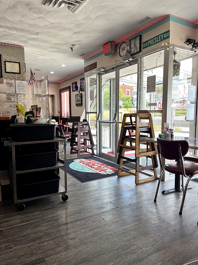 The entrance says it all: "Come as you are, leave fuller and happier." High chairs stacked by the door remind you this is a place for families, not food influencers with ring lights.