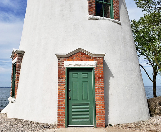 That jaunty green door isn't just an entrance&mdash;it's a portal to two centuries of maritime history and countless lighthouse keeper footsteps.