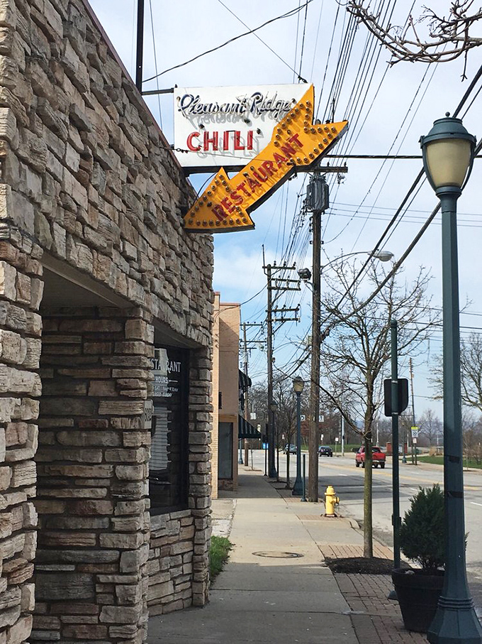 The view from inside feels like a portal between worlds&mdash;one foot in a timeless diner, one on a Cincinnati street that keeps changing.