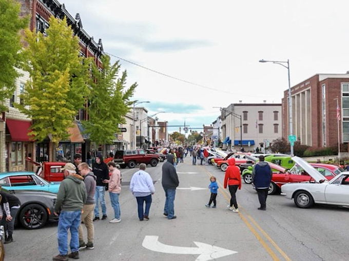 Classic car enthusiasts gather downtown, transforming Urbana's main street into a chrome-and-candy-colored timeline of American automotive history.