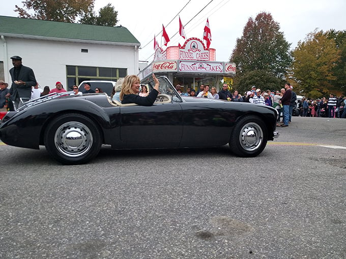 Oyster Festival parade – where vintage convertibles carry local celebrities and everyone pretends not to be jealous of that classic roadster's gleaming finish.