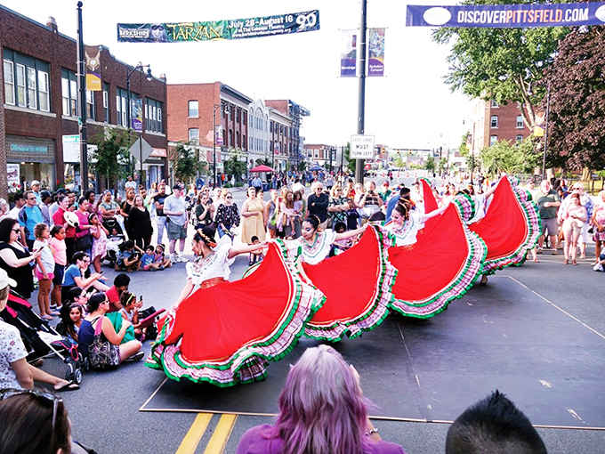 Third Thursday celebrations transform downtown into a vibrant cultural tapestry, where traditional dancers create swirls of color against the historic streetscape.
