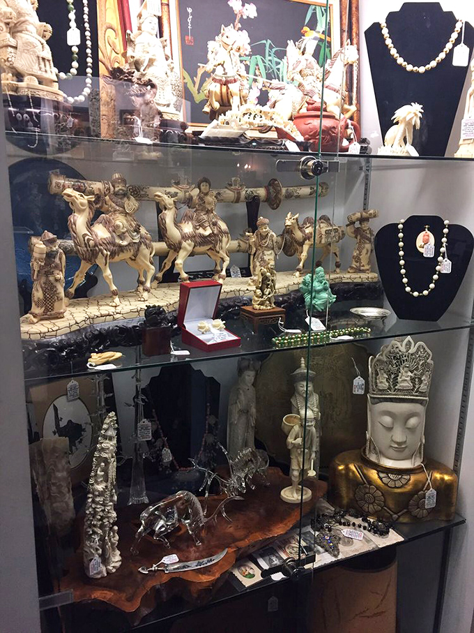 Eastern treasures displayed with reverence. These intricate figurines traveled farther to reach Ohio than most of us will in a lifetime.