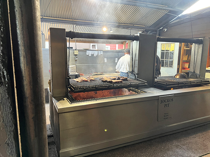 Behind-the-scenes magic happens here, where skilled grill masters tend oak fires that transform beef into legends.