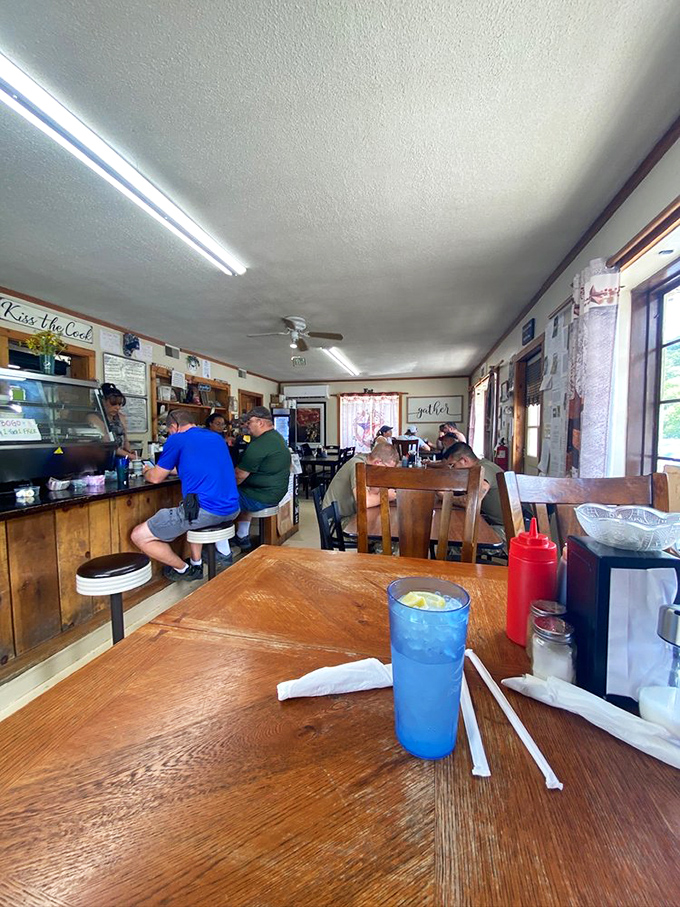 Blue drinks in plastic tumblers, wooden tables worn smooth by countless elbows&mdash;this is where memories are made between mouthfuls.
