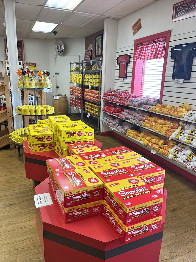 Candy boxes stacked with military precision. The yellow and red packaging serves as a beacon of hope in troubled times.