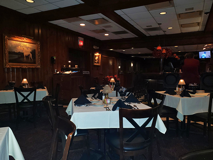 Classic checkerboard floors and warm lighting create an atmosphere that whispers "relax, you're home now" to every guest who enters.