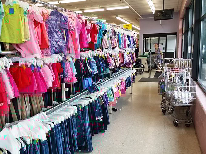 The children's clothing aisle: a rainbow of tiny fashions where parents can outfit growing kids without the growing pains in their wallets.