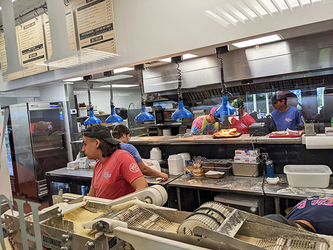 Where the magic happens: Jolly Rogers' kitchen crew transforms Lake Erie's bounty into the golden treasures that keep locals coming back.
