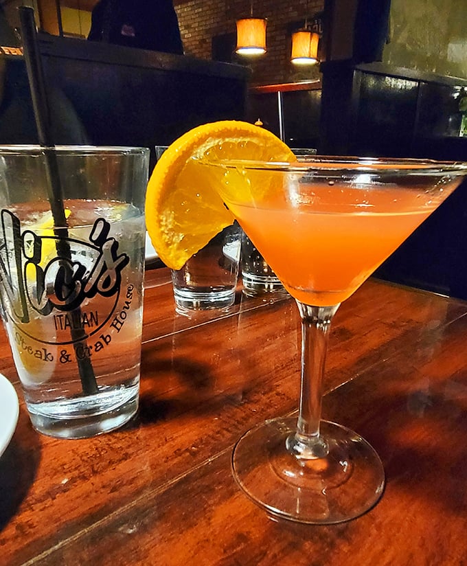 That martini isn't just orange&mdash;it's a sunset in a glass, promising the perfect prelude to an evening of Italian indulgence.