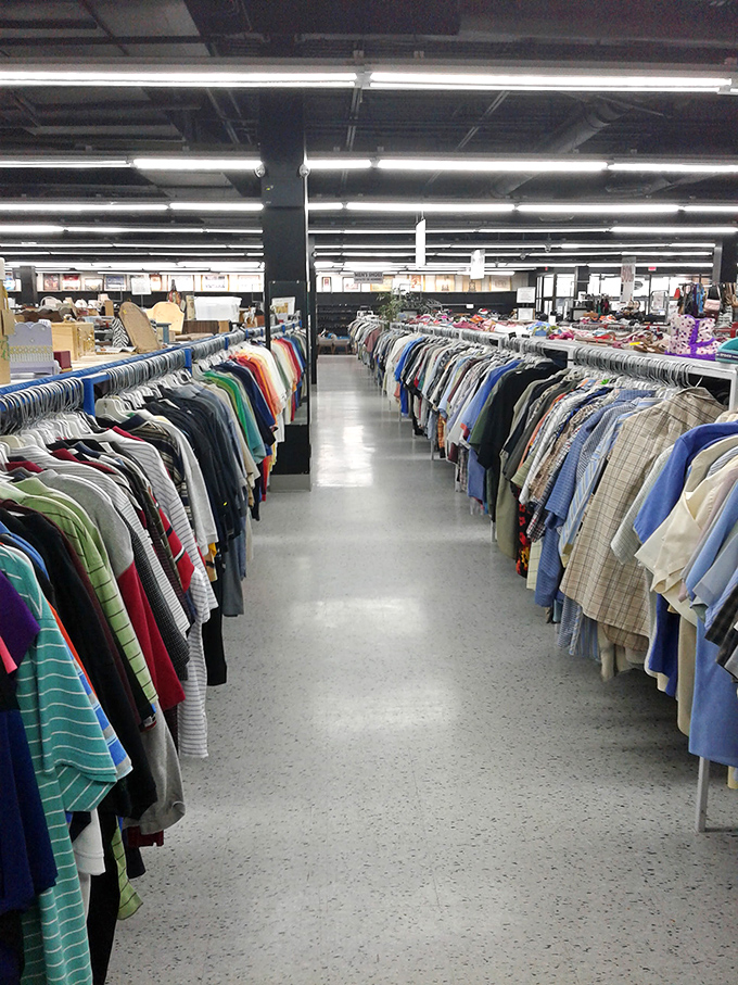 Men's shirts lined up like colorful soldiers, each one waiting for the right person to give it a second tour of duty.