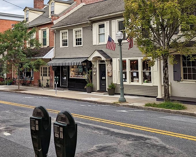 Striped awnings and carefully maintained storefronts create the kind of Main Street that makes you wonder if you've somehow stepped into a more civilized era.