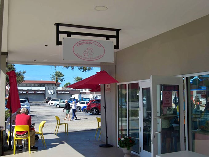 Al fresco seating with cheerful yellow chairs&mdash;because pastries taste even better with a side of Florida sunshine.