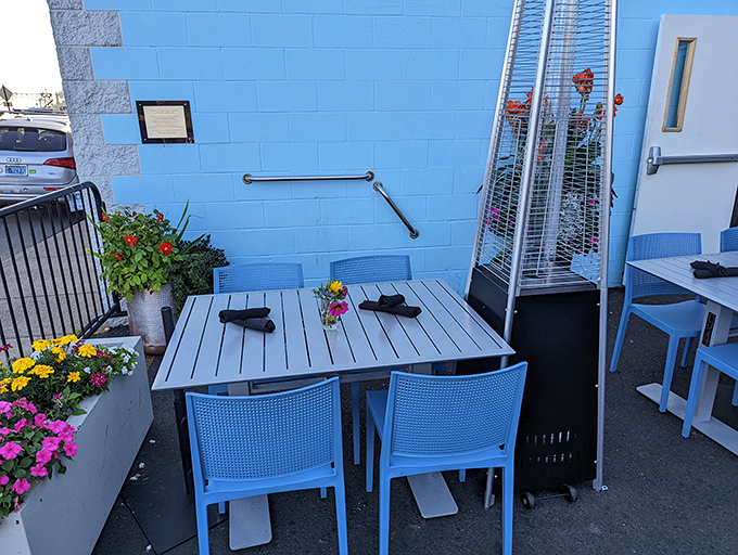 Outdoor dining with a side of fresh sea air. These blue chairs have witnessed countless "Oh my God, you have to try this" moments.