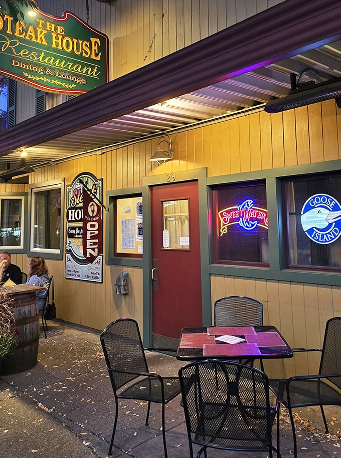 Evening ambiance with neon beer signs glowing like beacons of hospitality&mdash;sidewalk seating for those perfect Pennsylvania nights.