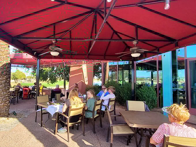 Al fresco dining under the red canopy offers the chance to enjoy both your meal and Arizona's legendary blue skies.