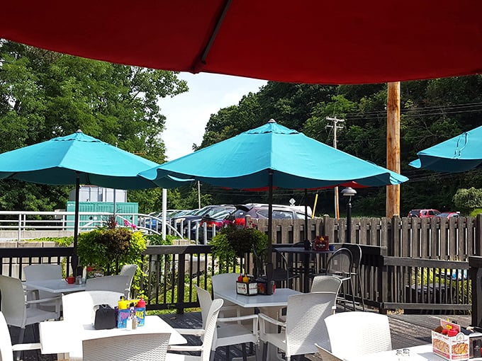 The outdoor patio offers a breath of fresh air with those signature turquoise umbrellas. Ohio summers were made for moments like this.