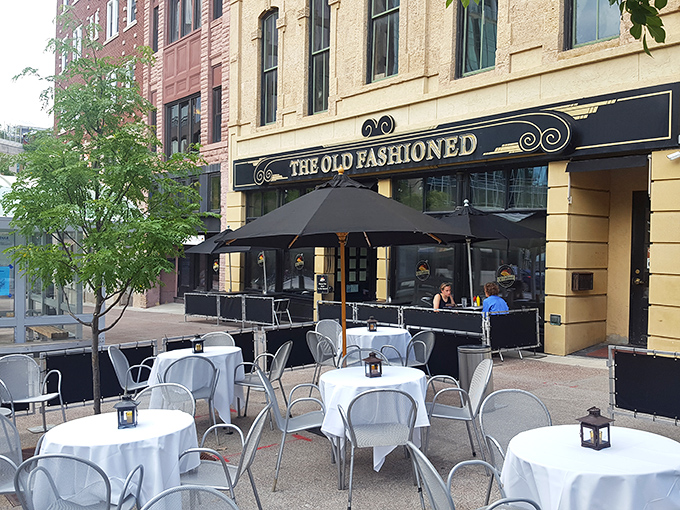 Outdoor tables wait for warmer days, when Capitol Square becomes Madison's most scenic dining room and Wisconsin's flavors spill onto the sidewalk.