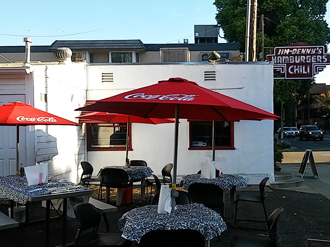 When Sacramento weather cooperates, these outdoor tables become the hottest real estate in town. Coca-Cola umbrellas included.