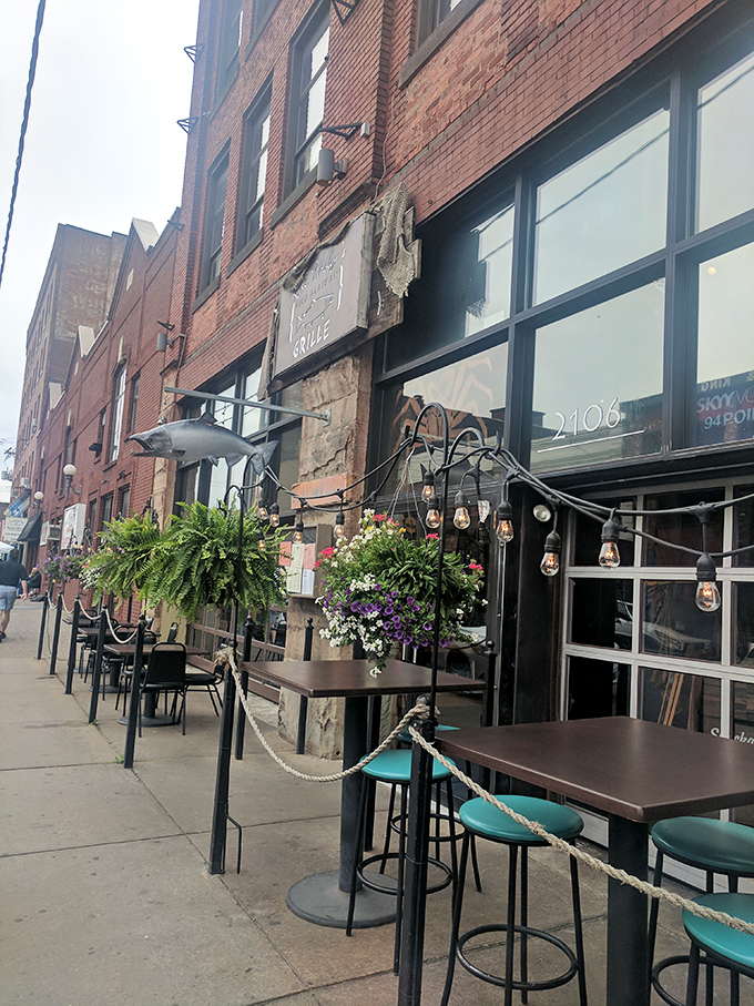 The Strip District's sidewalk seating isn't just outdoor dining&mdash;it's Pittsburgh's breakfast theater. Those hanging plants are the unofficial audience.