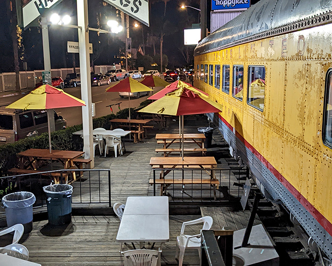 The evening transforms Carney's outdoor seating into prime real estate for soaking in the electric energy of Sunset Boulevard.