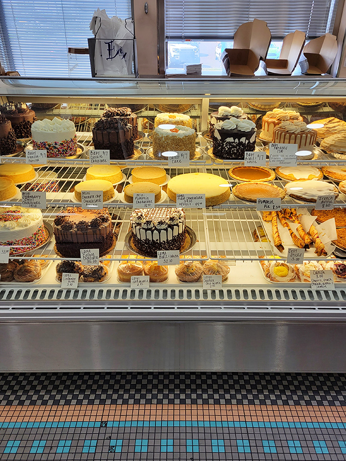 The dessert case—where willpower goes to die. Each shelf displays edible works of art that make "I'll just have coffee" the biggest lie in Philadelphia.