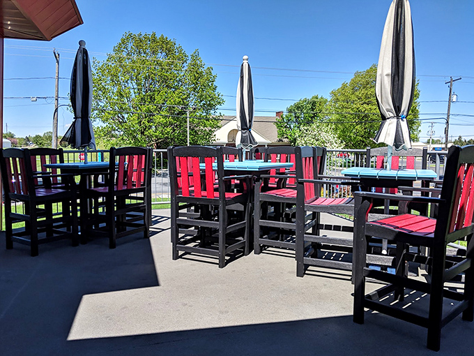 Even the patio keeps the vibe going. These high-top tables aren't just outdoor seating—they're front-row tickets to people-watching with a side of fresh air.