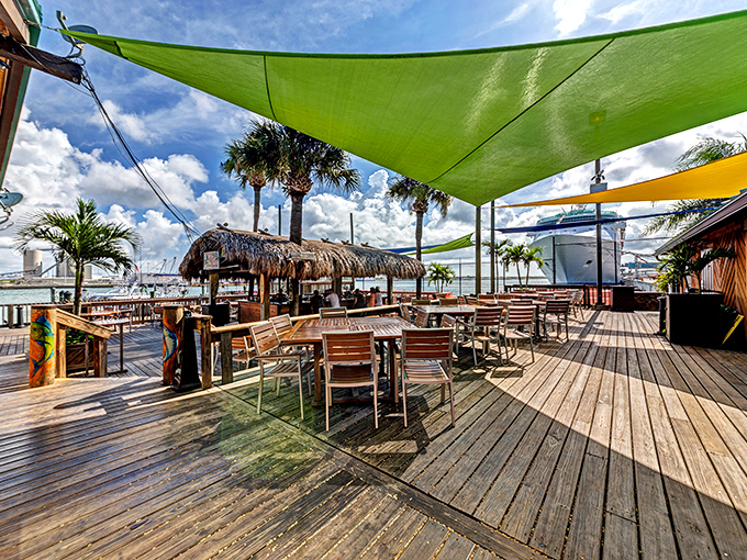 Colorful shade sails and waterfront views make this deck the perfect stage for your personal vacation movie. Just add seafood and roll camera.