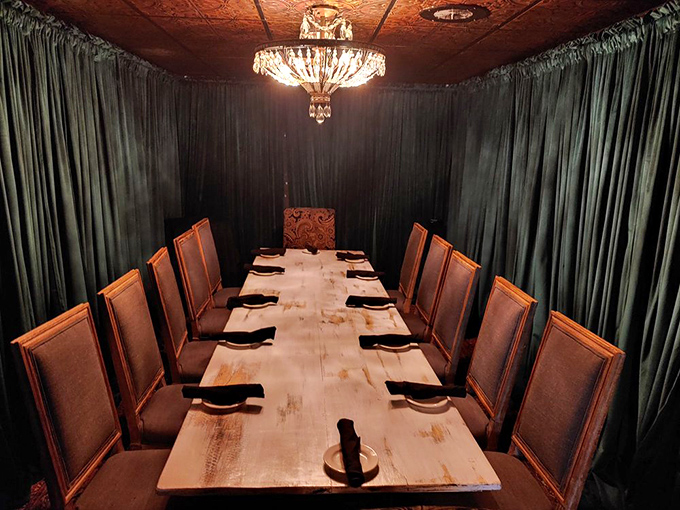 The private dining room whispers of celebrations yet to come. Elegant drapes and a statement chandelier transform business dinners into memorable occasions.