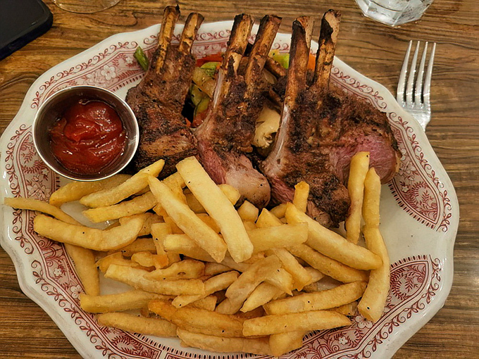 Rack of lamb that makes you want to write poetry. Those perfectly charred bones stand like sentinels guarding treasures of tender meat.