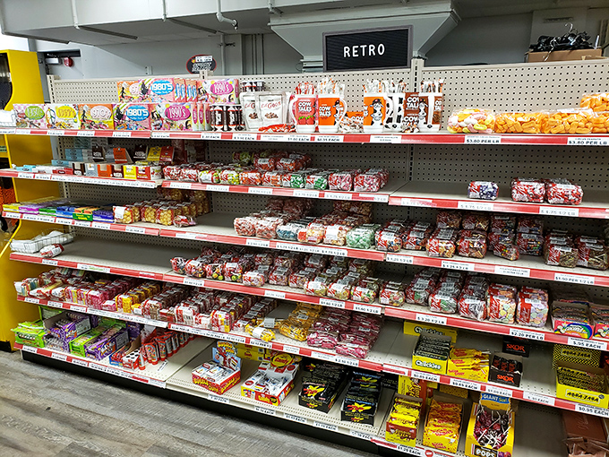 The "Retro" sign marks territory where candy time travel happens. These shelves hold the flavors of your childhood, perfectly preserved.