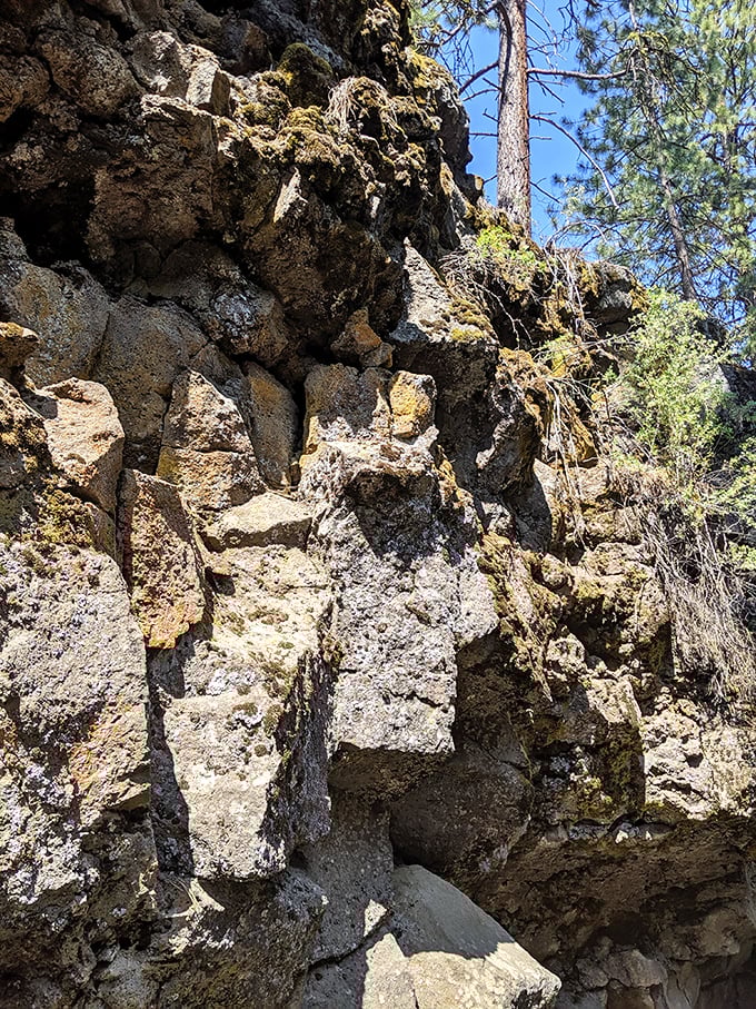 Volcanic rock formations create a natural staircase near the cave entrance. These rugged steps, formed during ancient eruptions, have witnessed thousands of years of geological history.