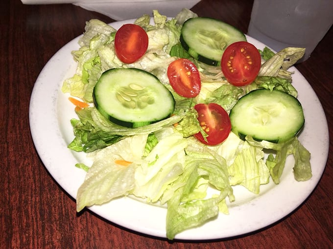 A simple house salad that says, "Yes, I'm being responsible before demolishing that 16-ounce steak." Balance is everything.