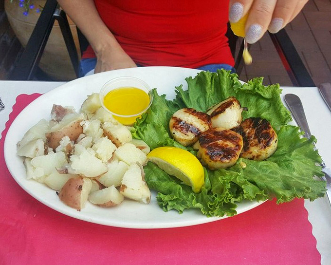 These scallops have been introduced to fire with proper respect, resulting in a perfect sear that would make Neptune himself applaud.