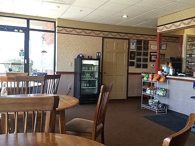 Simple wooden tables and chairs say, "We're not fancy, but you'll be back." The best conversations happen in places just like this.