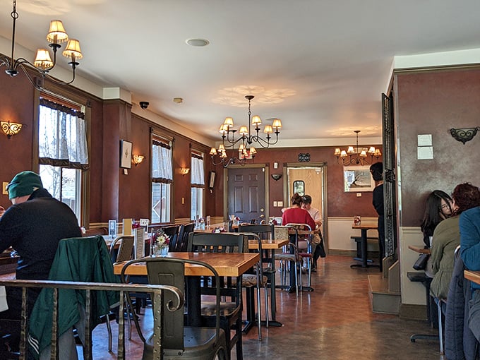 Warm wood tones and soft lighting create the perfect backdrop for food-focused conversations and memorable neighborhood gatherings.