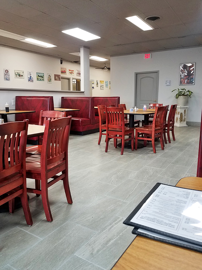 Red chairs and booths create an atmosphere where you're equally comfortable having a business meeting or nursing a hangover with coffee.